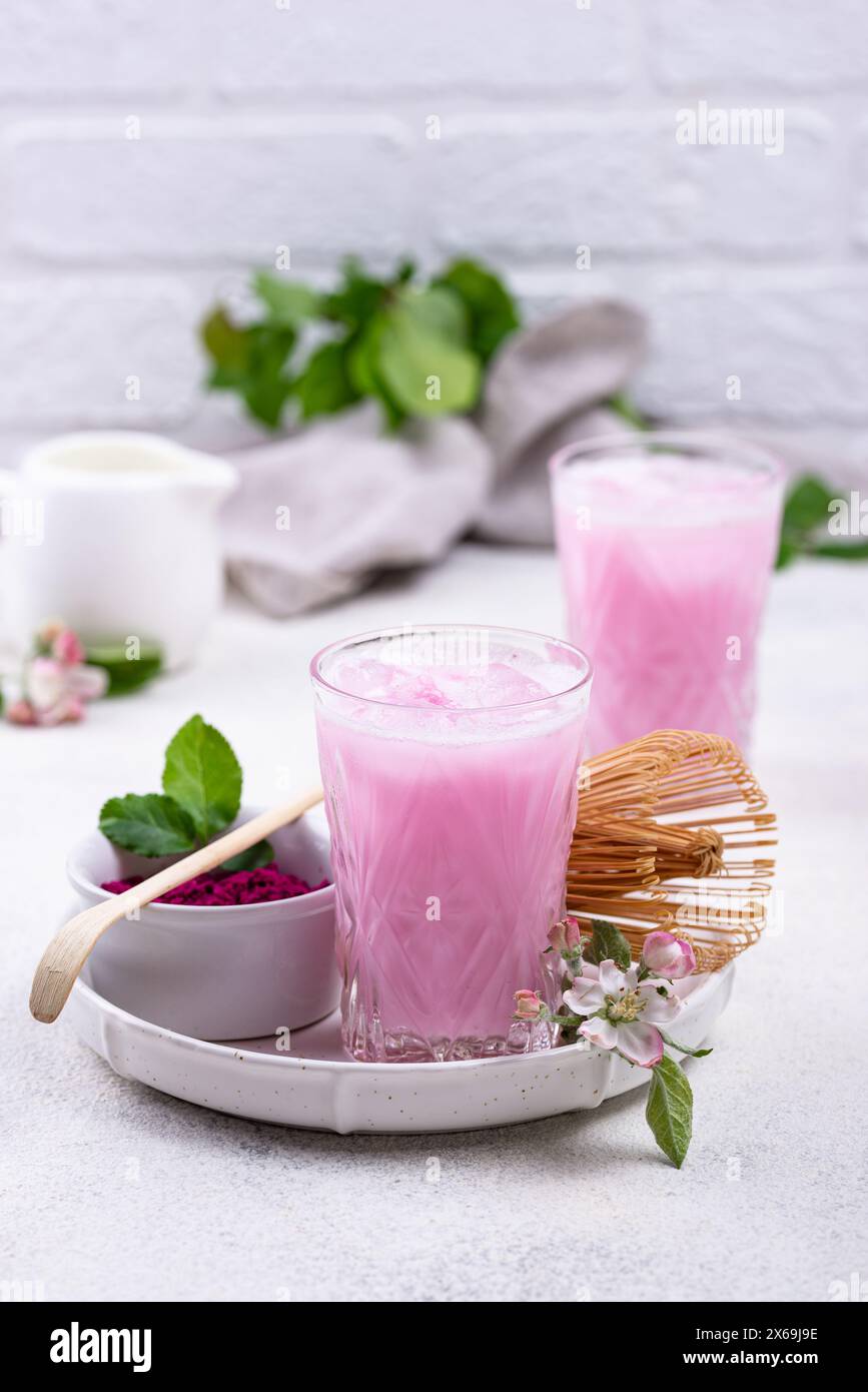 Pink matcha ice latte with milk Stock Photo - Alamy