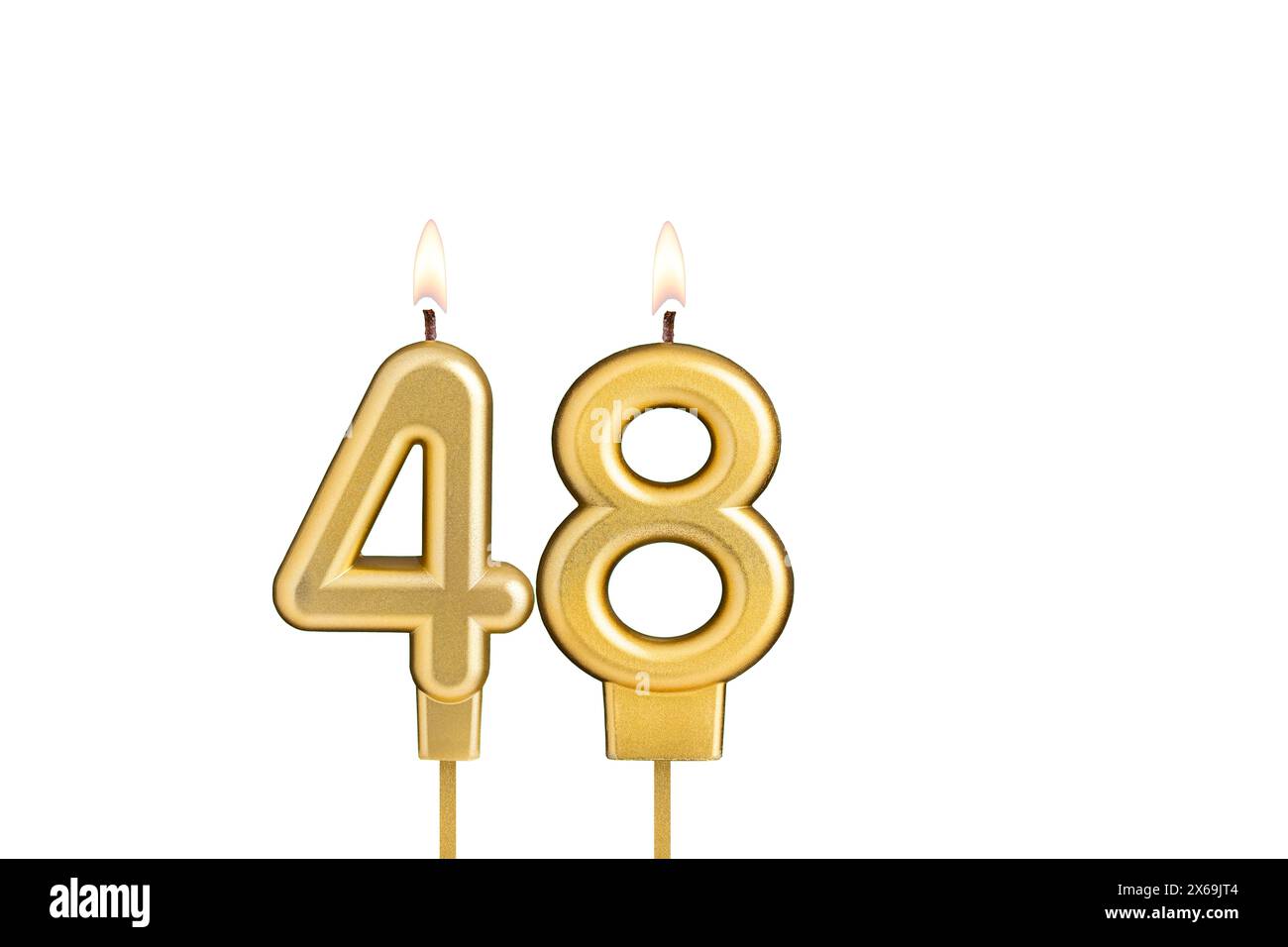 Golden number 48 birthday candle on white background Stock Photo - Alamy
