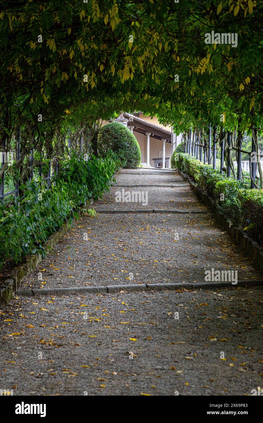 quiet pathway and park benches in the Giardino Bardini, Florence Italy ...