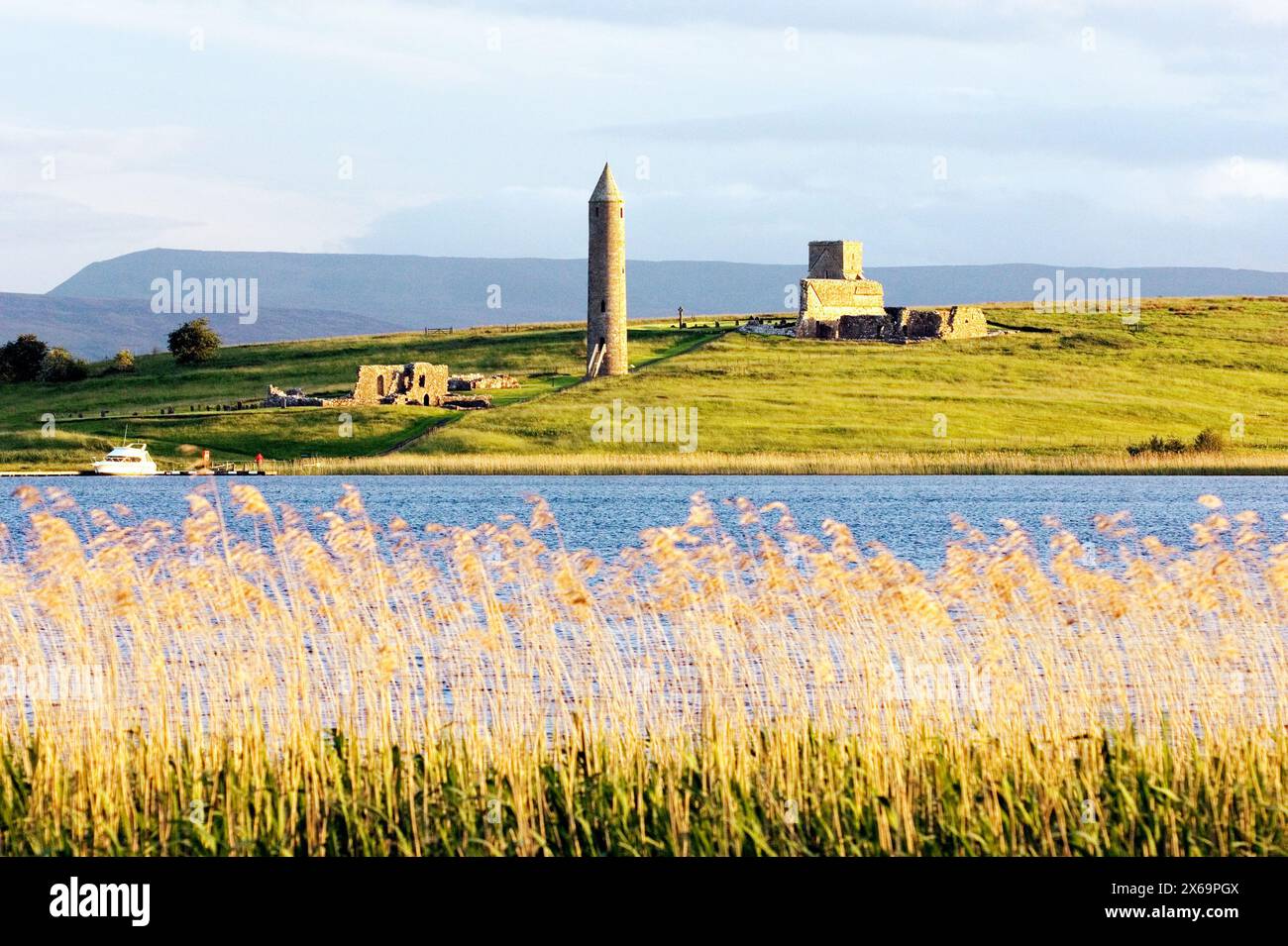 Devenish Island round tower and Celtic Christian monastic ruins. Lower ...
