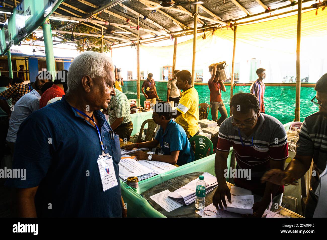 The polling officers and other election officials are called in the ...