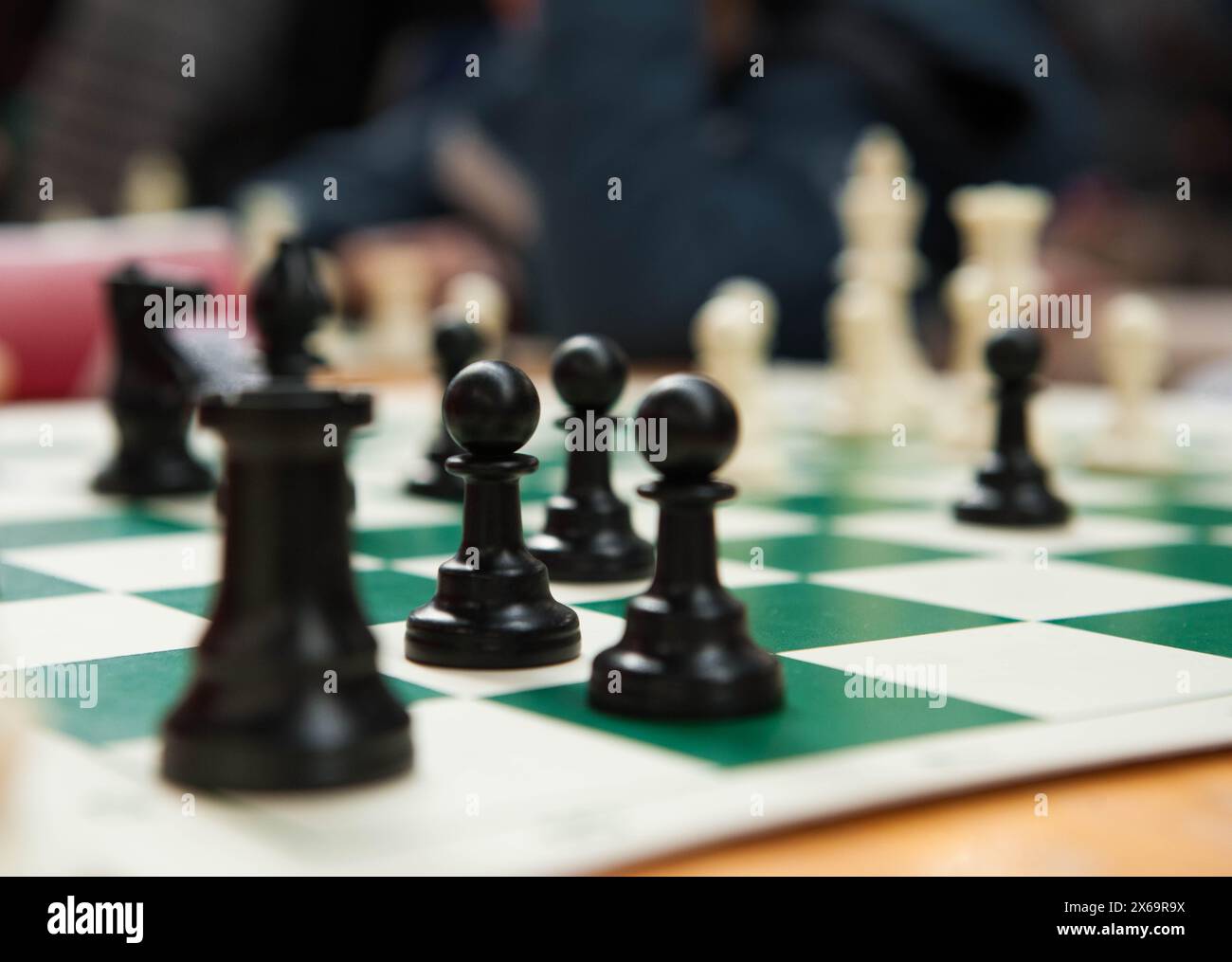 Chess game, black pawns on the chessboard Stock Photo - Alamy