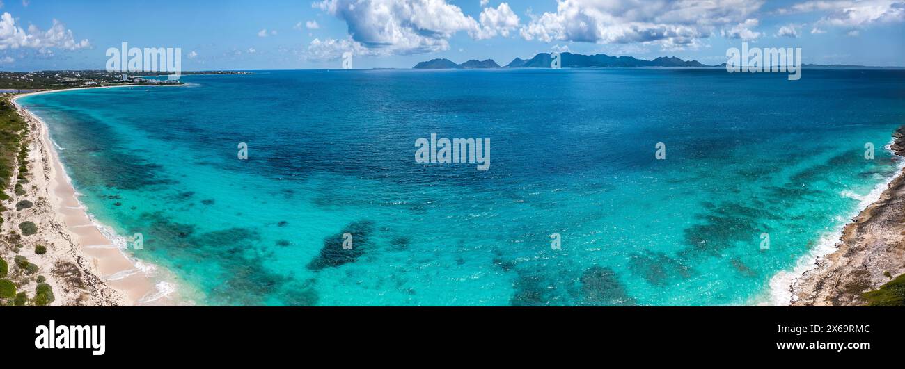 Aerial panoramic of Cove Bay near Cap Juluca with Saint Martin in the ...