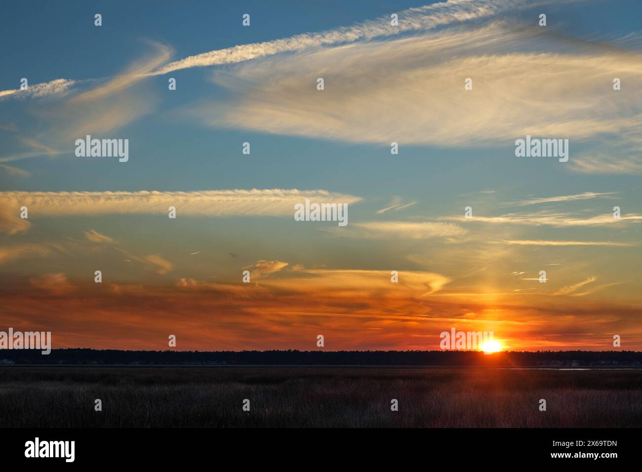 Sunset over salt marsh with incredible cloud sky Stock Photo - Alamy