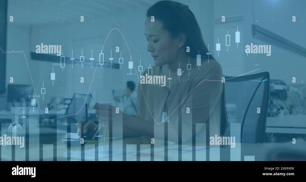 Focused asian woman diligently hi-res stock photography and images - Alamy