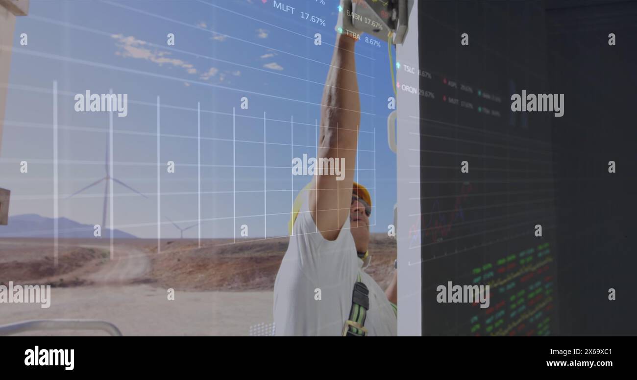 Image of financial data processing over caucasian engineer and wind ...