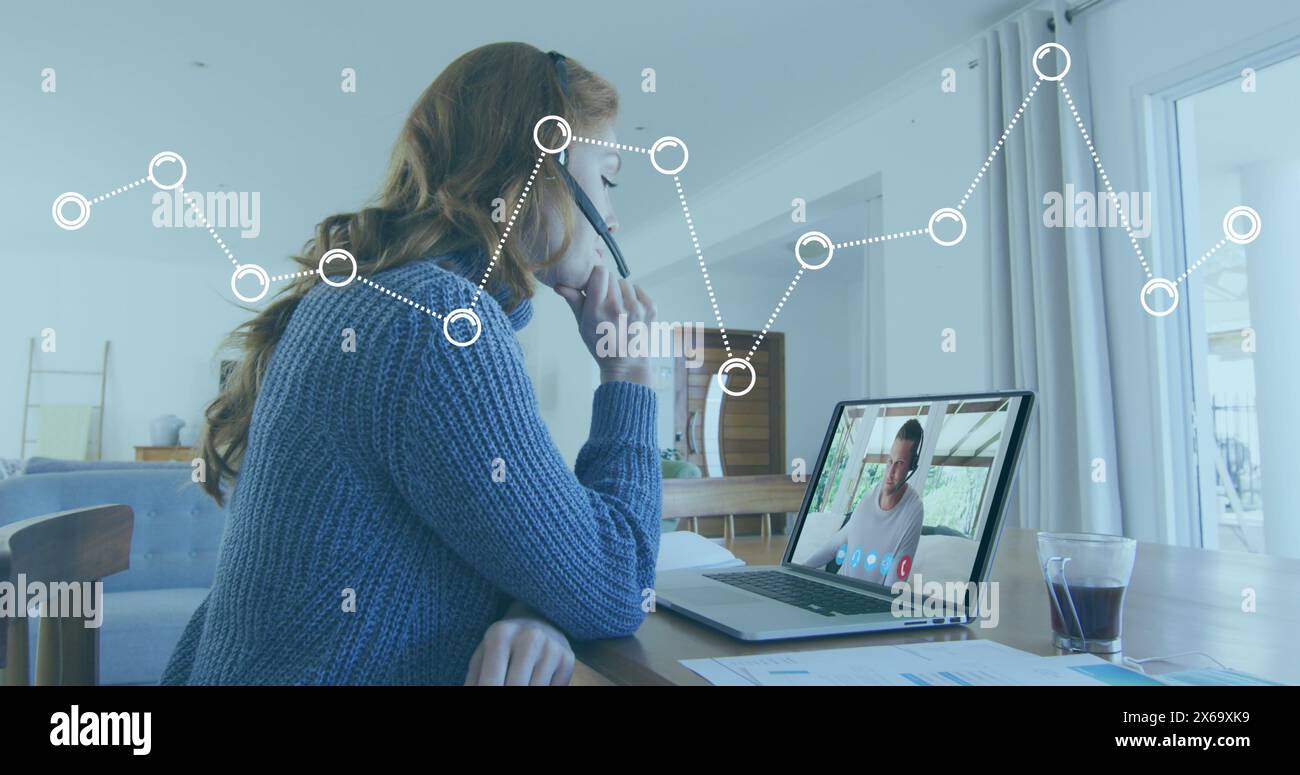 Image of graph processing data over caucasian woman at home making ...