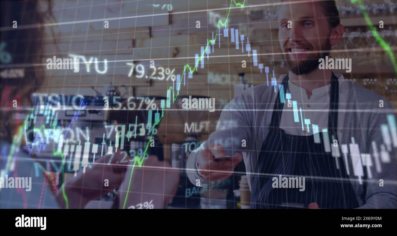 Image of graph, trading board over smiling male barista giving credit ...