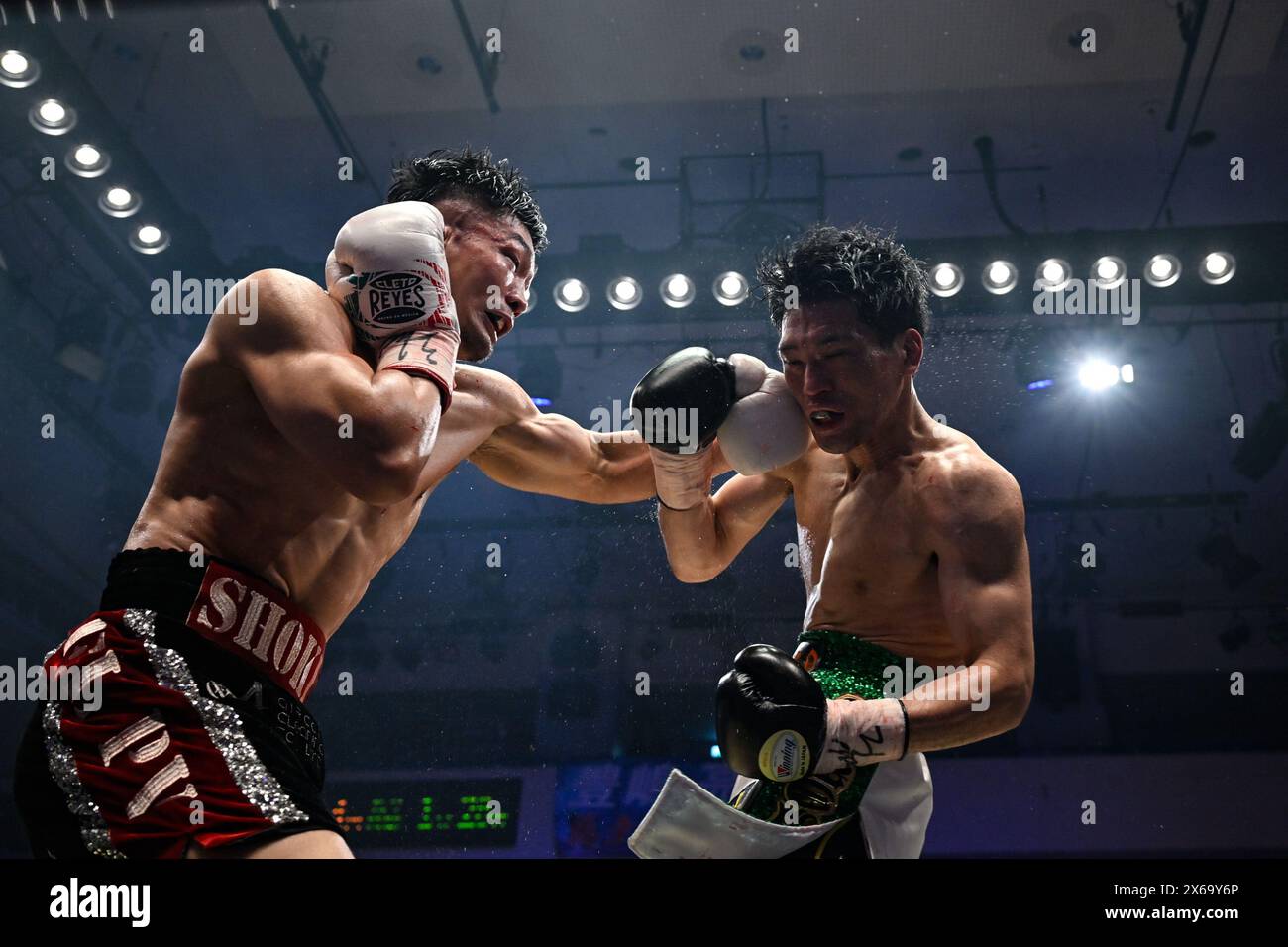 Shoki Sakai (white gloves) and Ryota Toyoshima (black gloves) compete during their Japanese ...