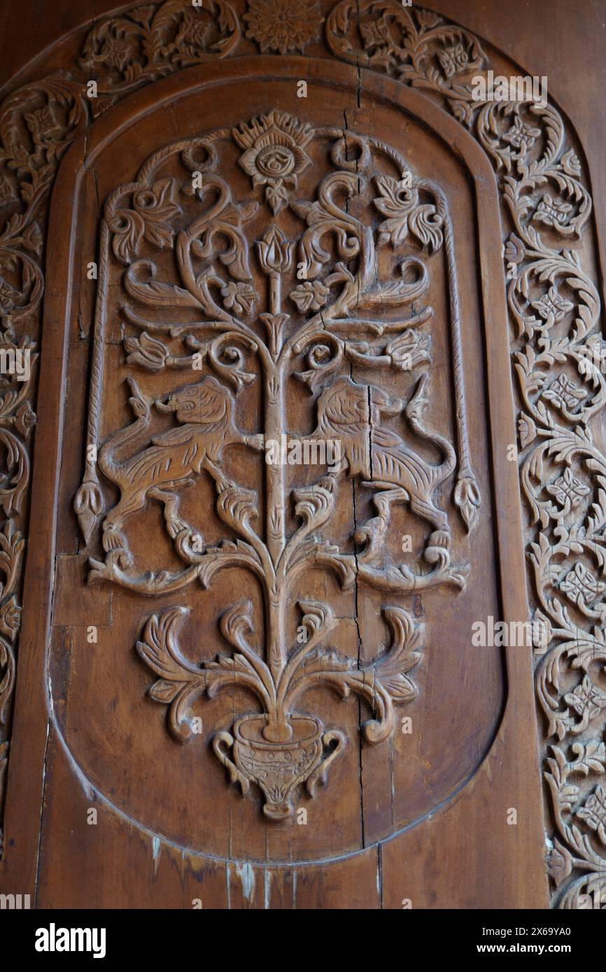 Decorative woodwork on the main entrance door. Baro Shardarbari (Palace of Senior Sardar ...