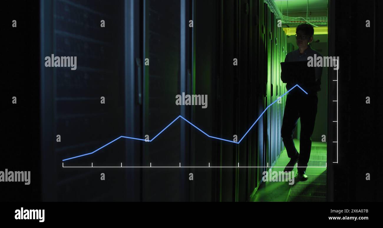 Image of line graph showing growth over asian male engineer with laptop ...
