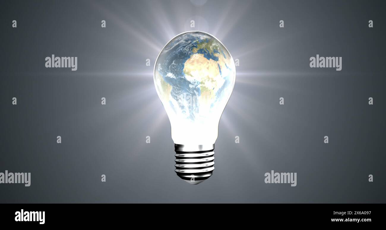 Image of circuit board pattern and globe in illuminated light bulb ...