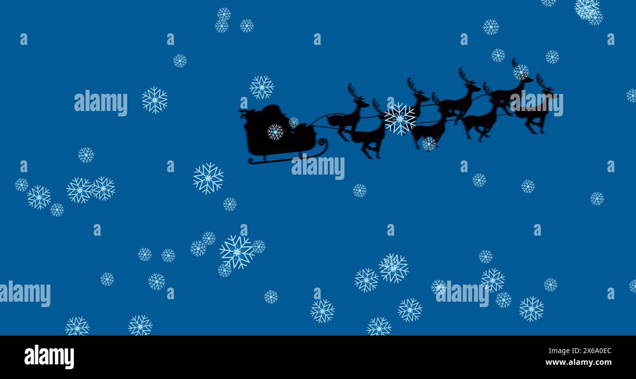 Image of falling snow over santa claus in sleigh with reindeer Stock ...