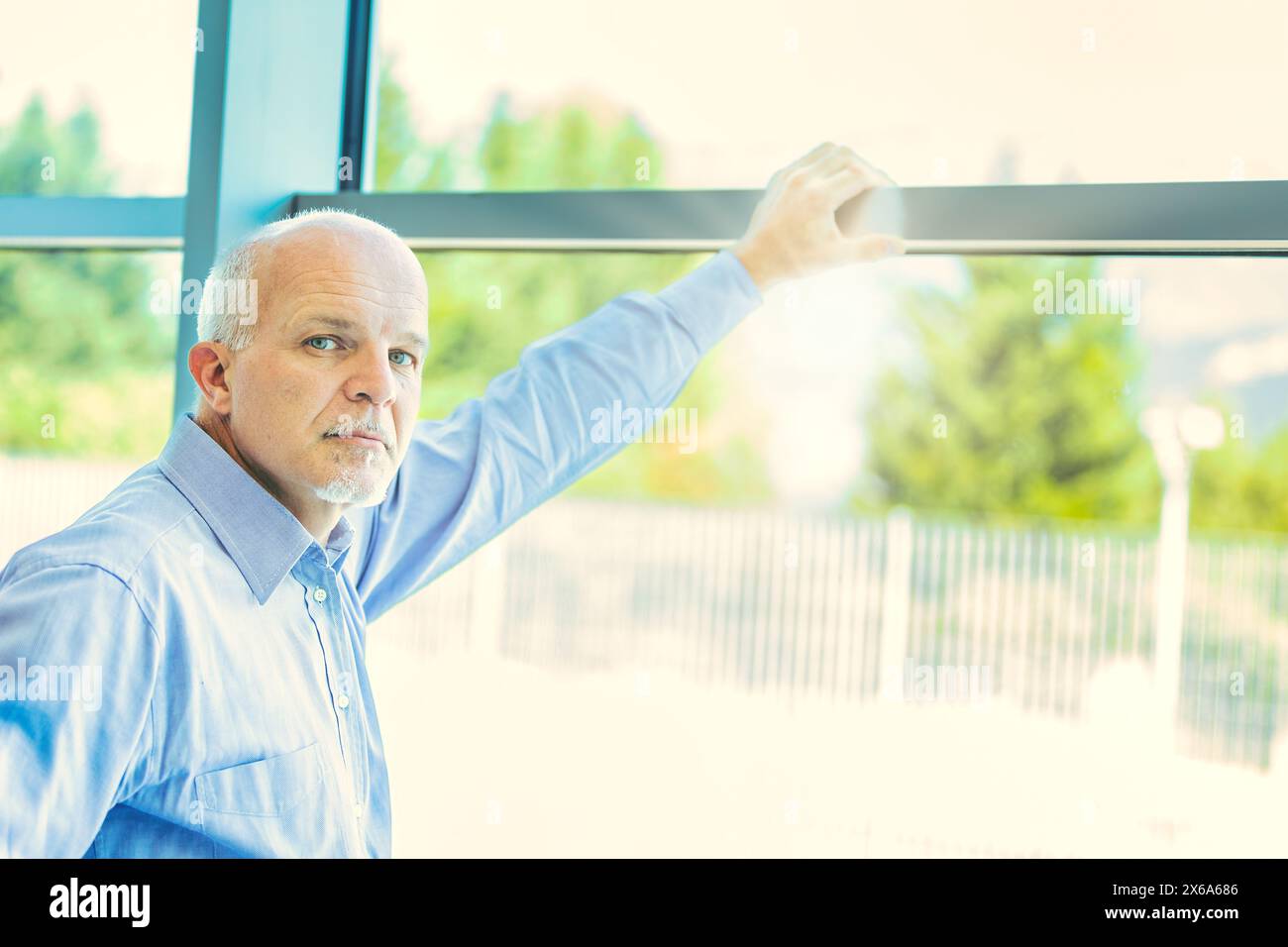 Natural light reflects on the window hi-res stock photography and ...