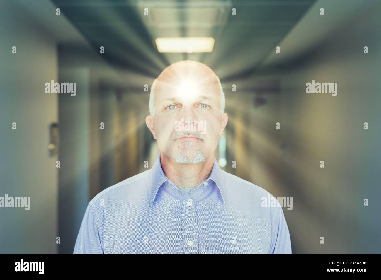 Elderly man glows from within, light casting forward from his presence ...