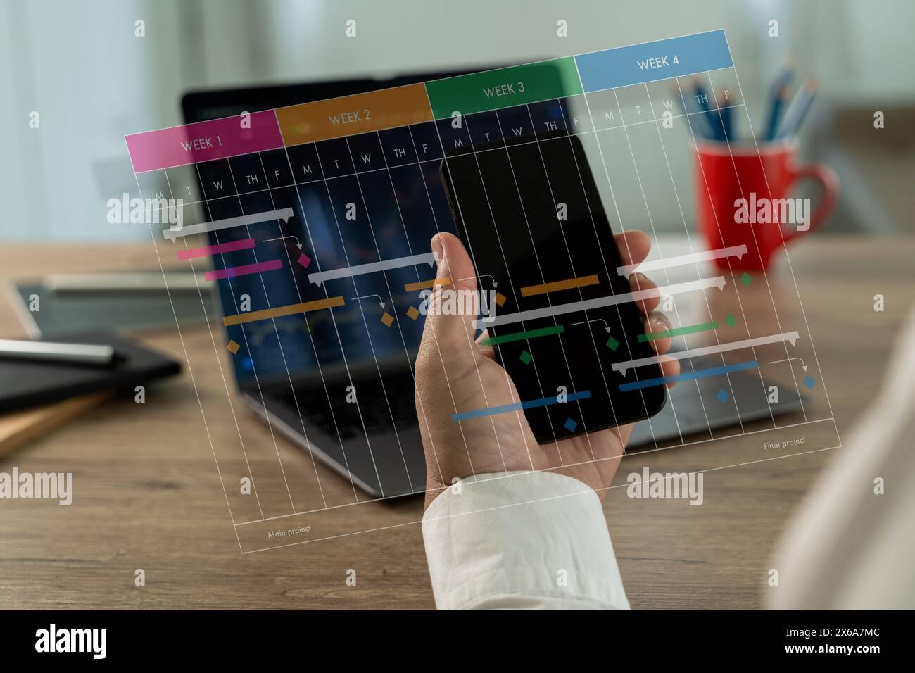 Project manager leading the computer interface update chart scheduling ...