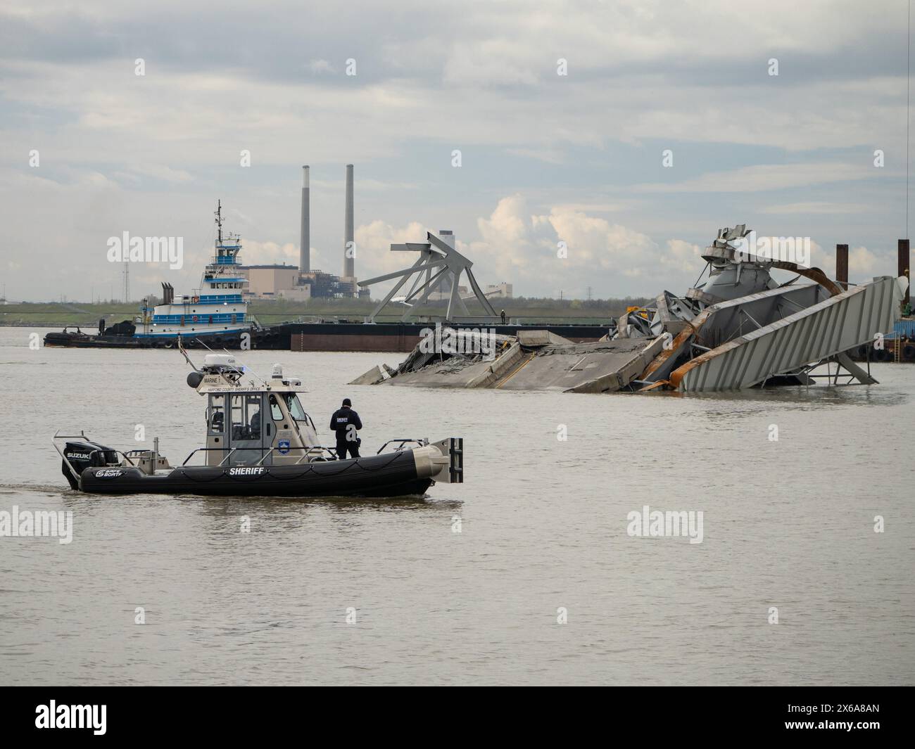 A portion of the collapsed Francis Scott Key Bridge truss is ...