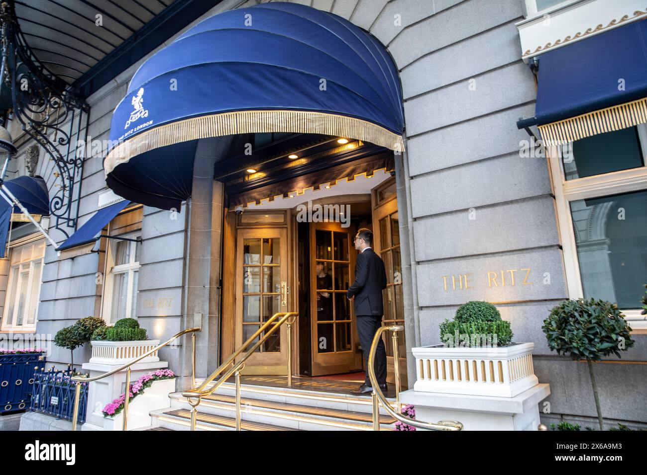 The Ritz Hotel in London,England, Union Jack beside the hotel entrance ...