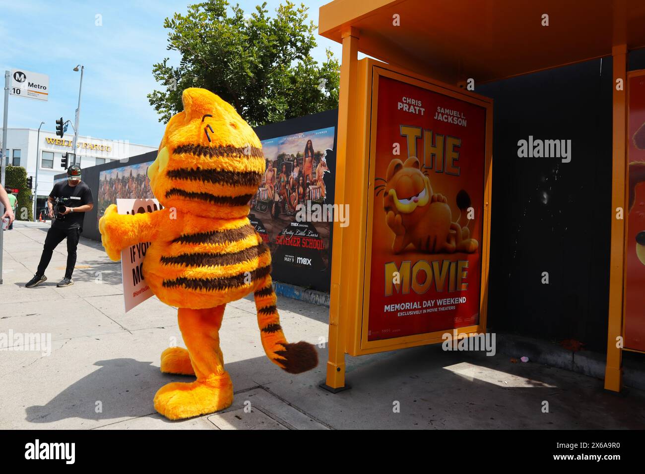 Los Angeles, California – May 13, 2024: Metro Bus Stop with graphic of ...