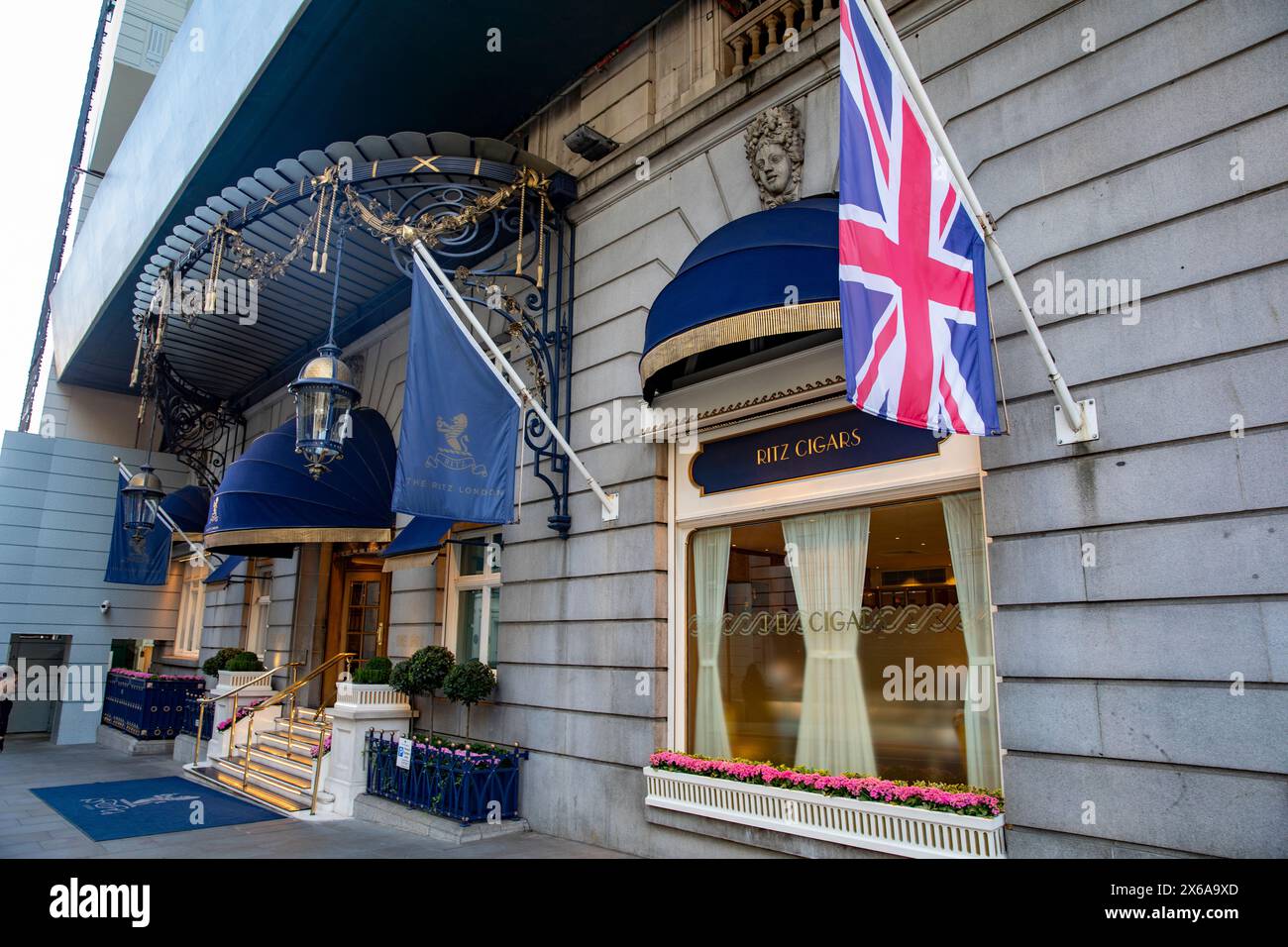 The Ritz Hotel in London,England, Union Jack beside the hotel entrance ...