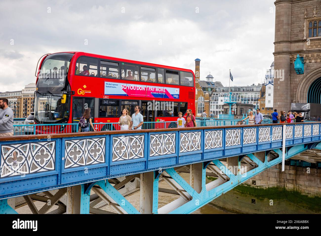 Tower Bridge London famous landmark, walkers tourists cross the bridge ...