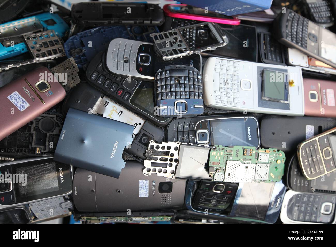 Close up of discarded Nokia and Blackberry mobile phones, 2000s ...