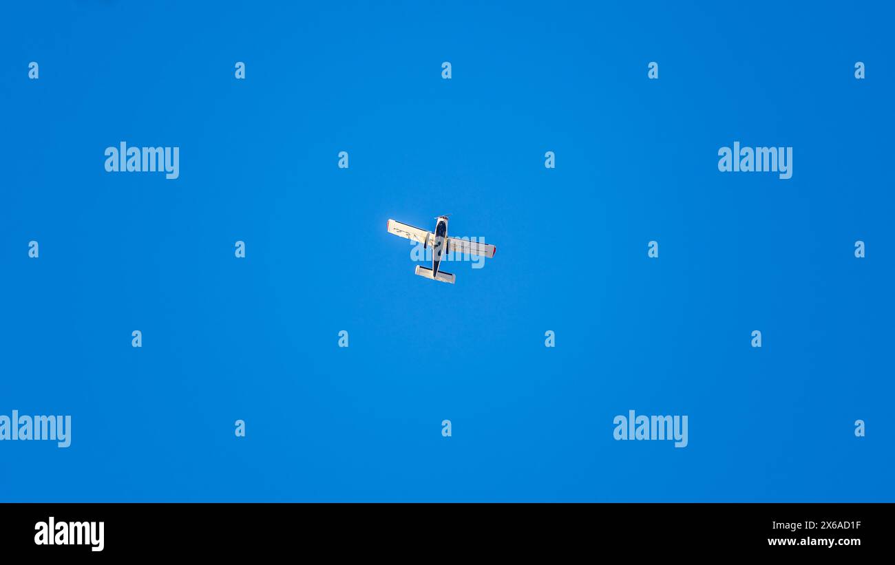 Small ultralight airplane with overhead wing and single propeller ...