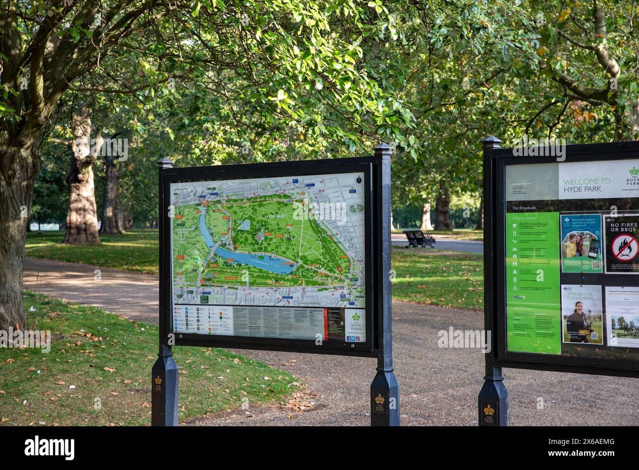 Hyde Park London in autumn, park entrance and tourist information signs ...