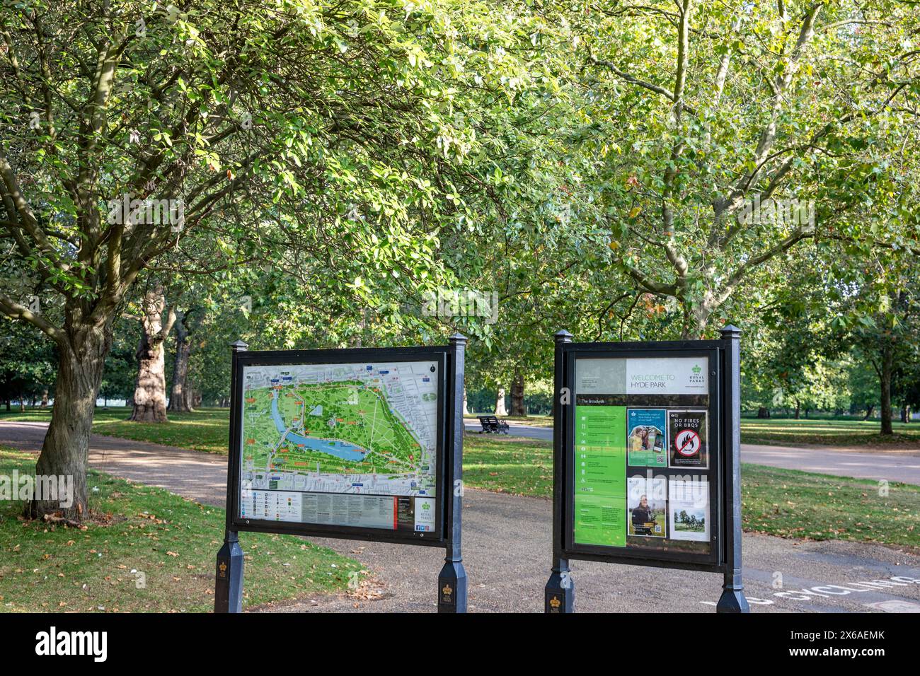 Hyde Park London in autumn, park entrance and tourist information signs ...