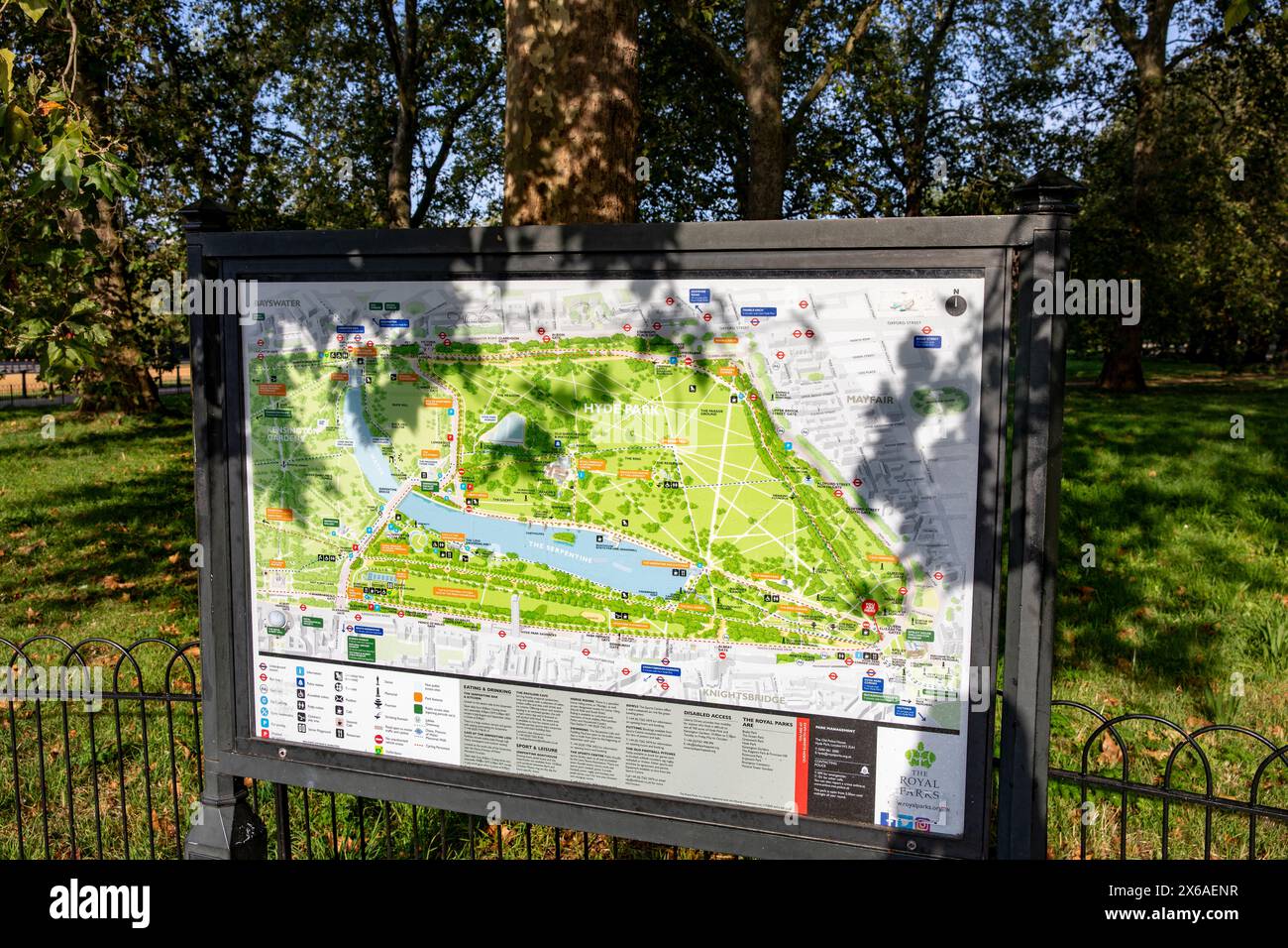 Hyde Park London in autumn, park entrance and tourist information signs ...