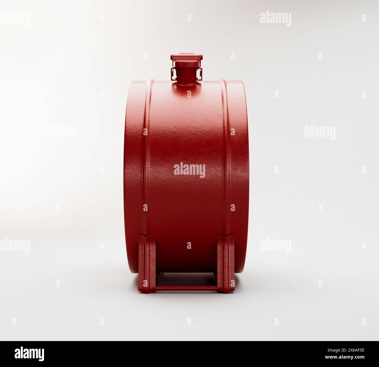A round shaped red vintage antique metal fuel container on an isolated ...