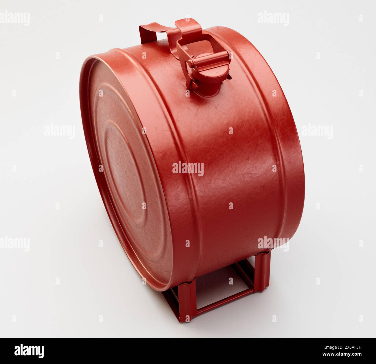 A round shaped red vintage antique metal fuel container on an isolated ...