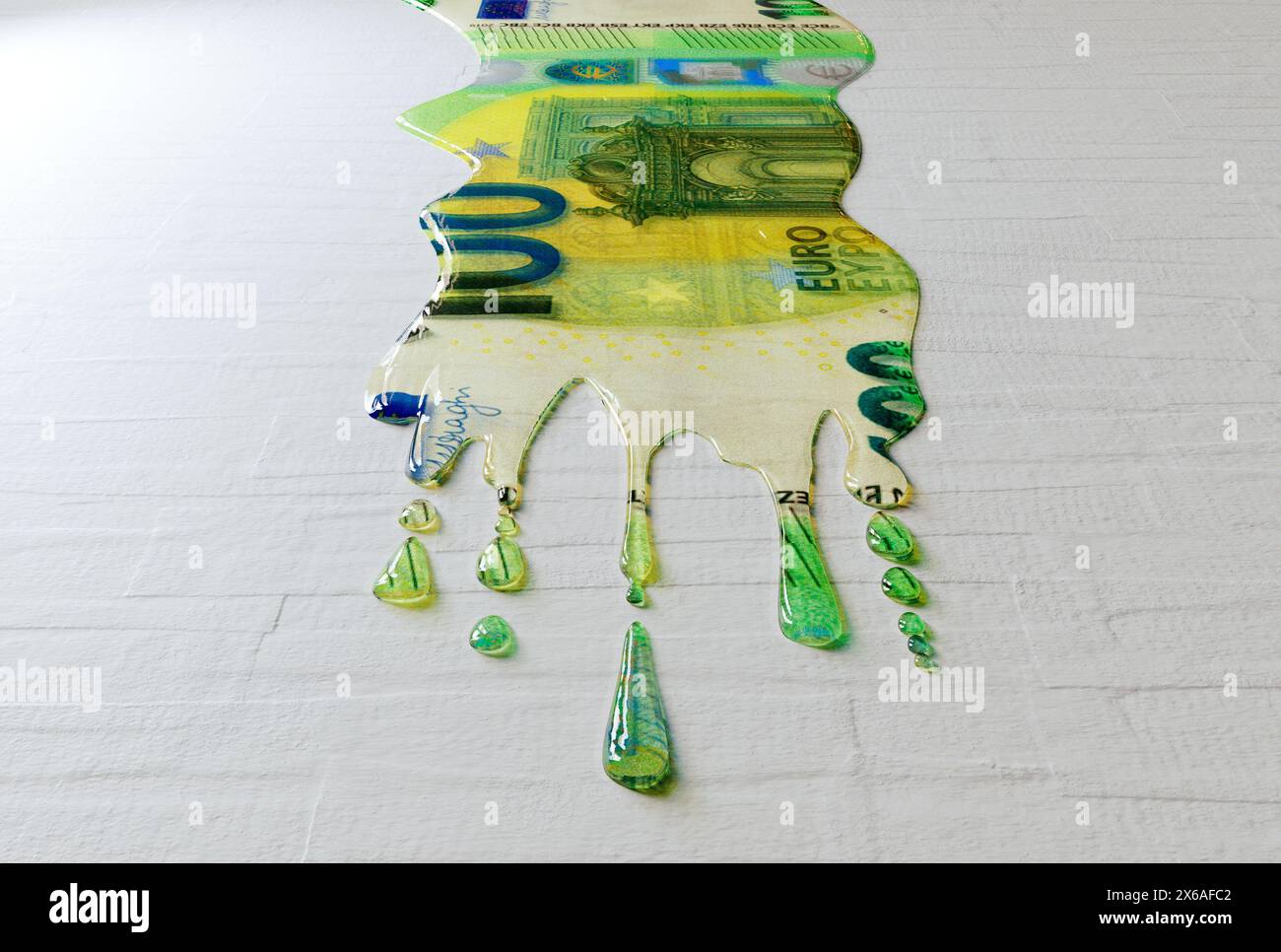 A concept image showing a regular European Euro banknote that is melted ...
