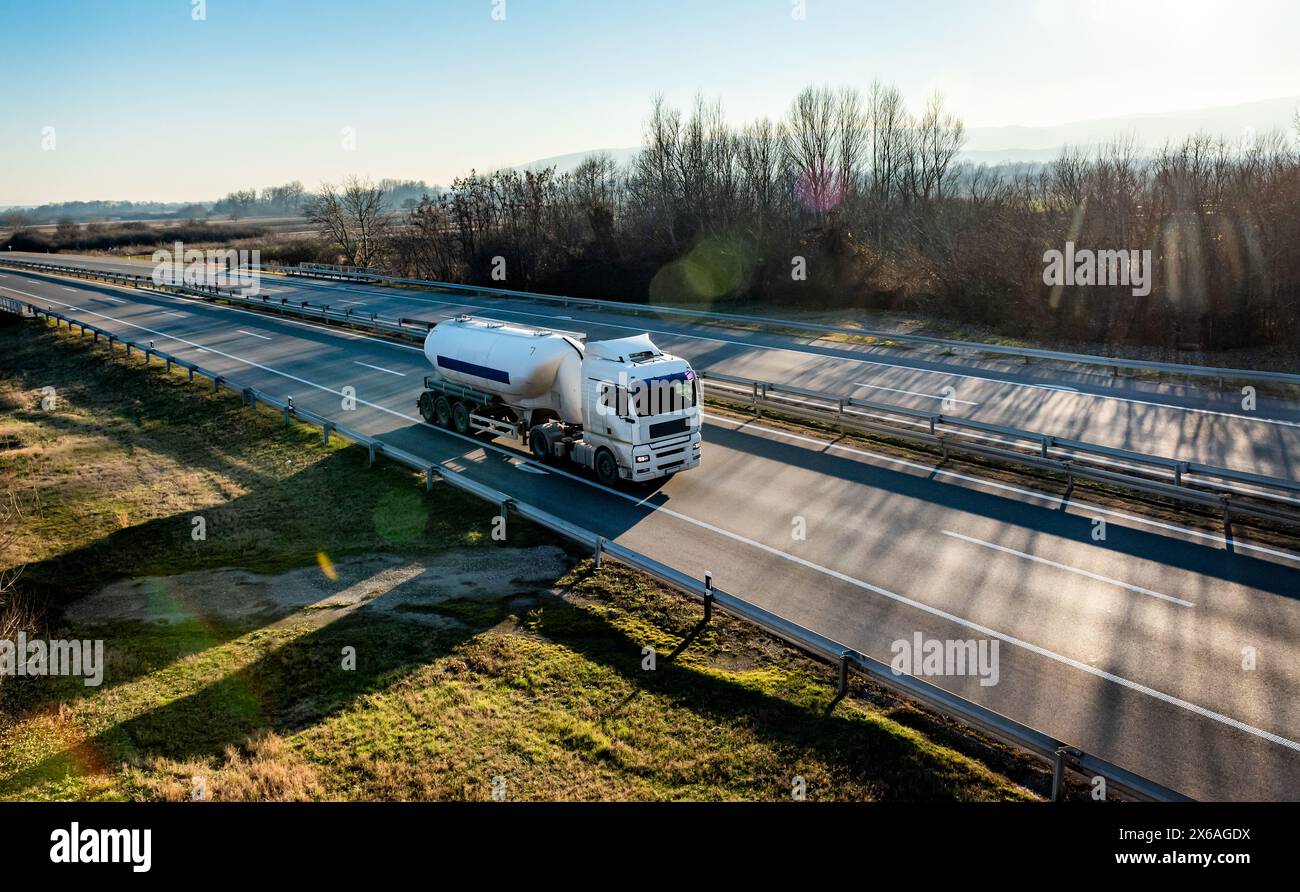 Orange road tanker moving hi-res stock photography and images - Alamy