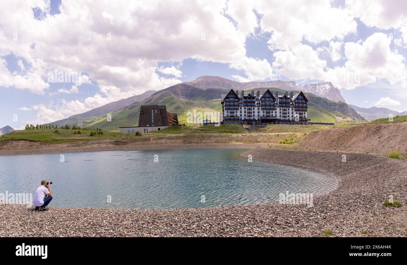 Kusar region. Azerbaijan. 05.17.2021. A photographer takes pictures of ...