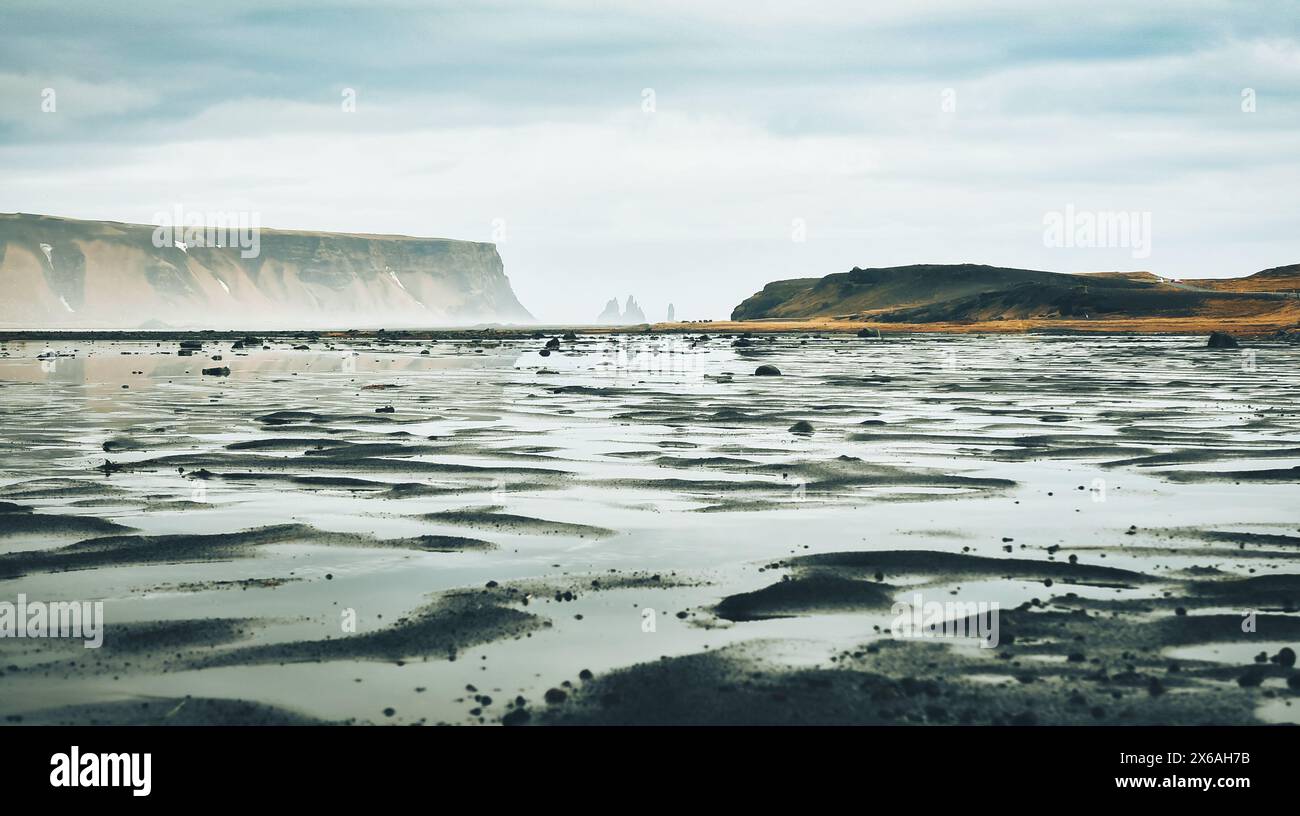 Reynisfjara Beach coast, majestic big rock formations cliff. Black ...
