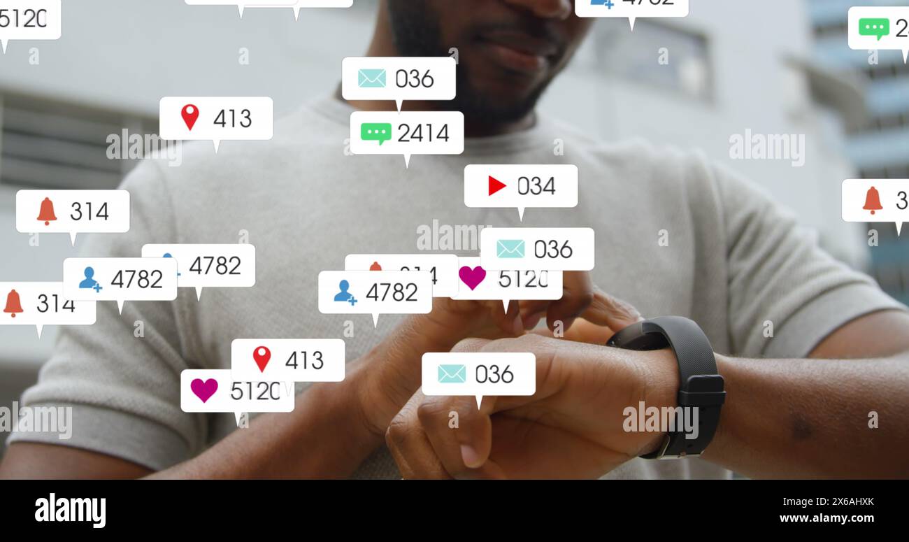 Image of social media icons falling over mid section of a man using ...