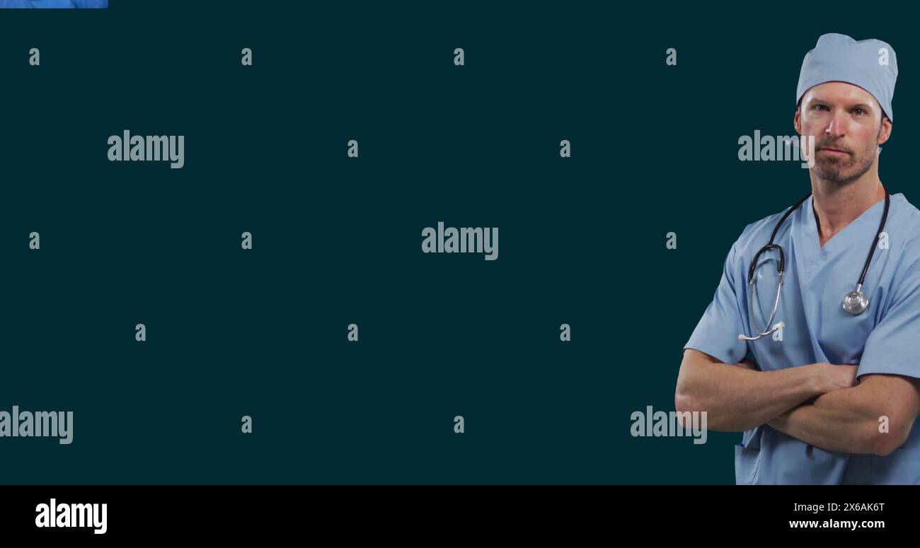 Image of caucasian male doctor wearing scrub standing arms crossed ...