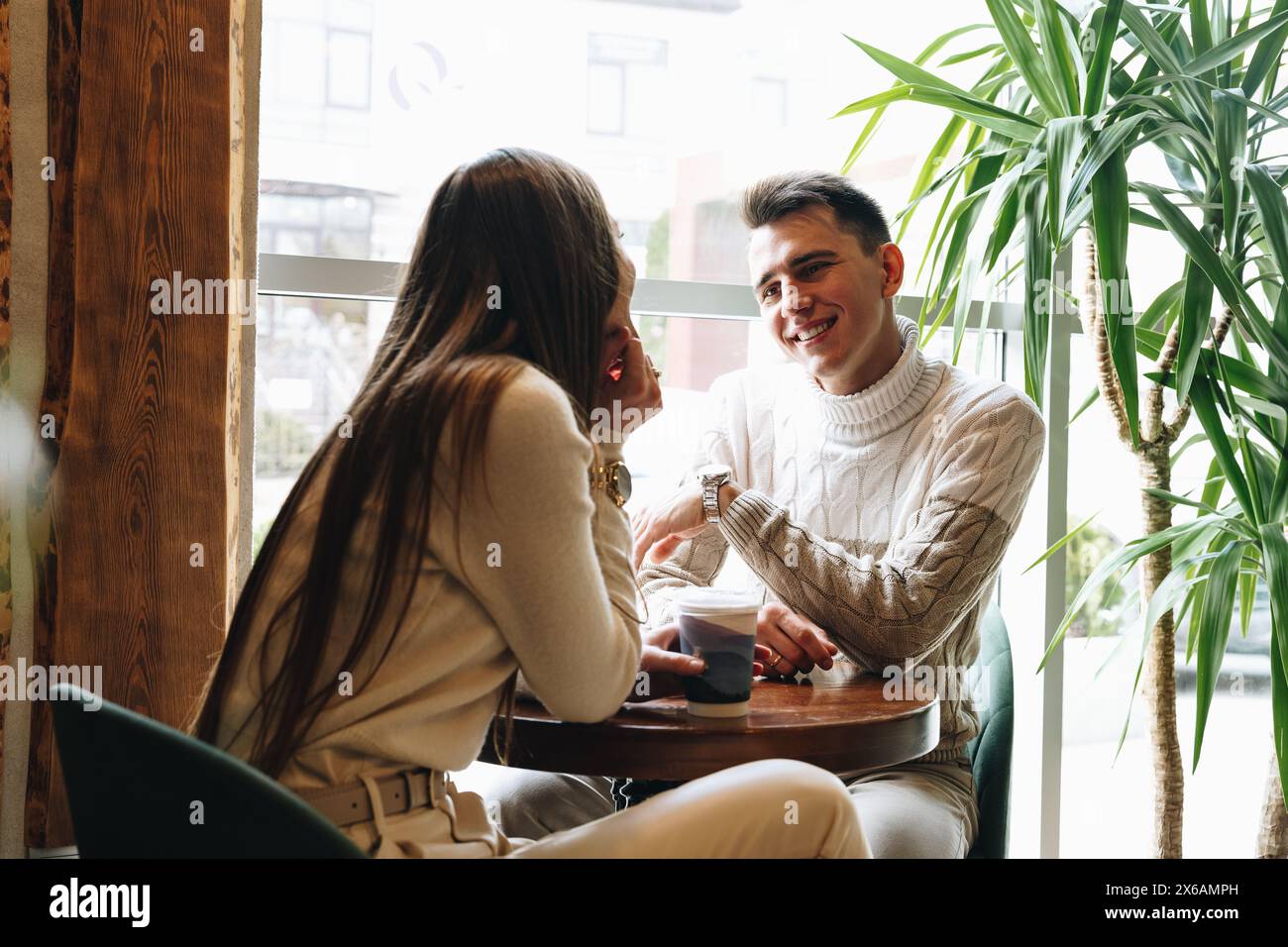 Woman seated table intently hi-res stock photography and images - Alamy