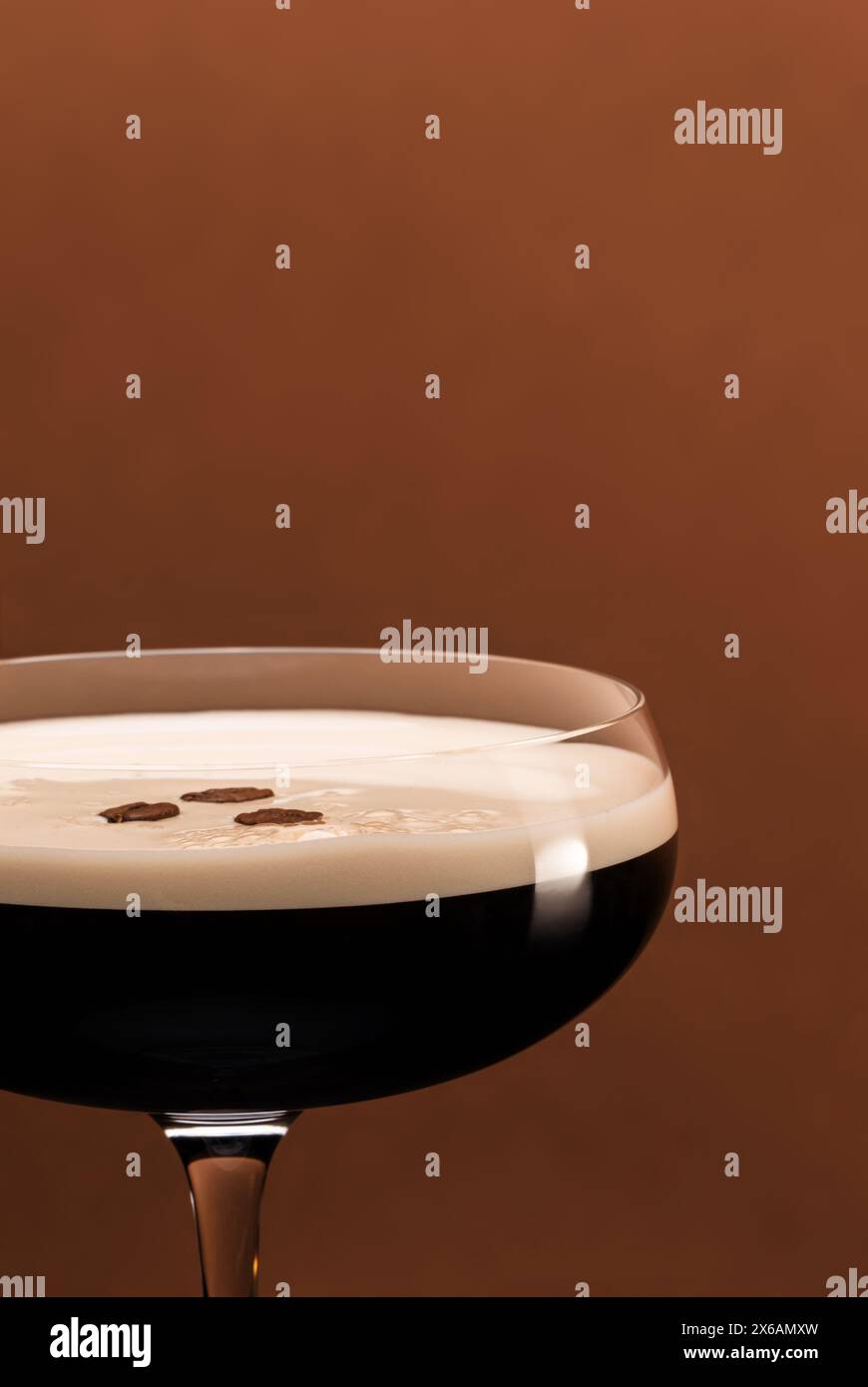 Espresso Martini cocktail served in fancy elegant coupe glass garnished ...