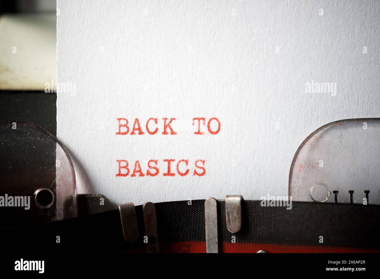 Back to basics text written with a typewriter Stock Photo - Alamy