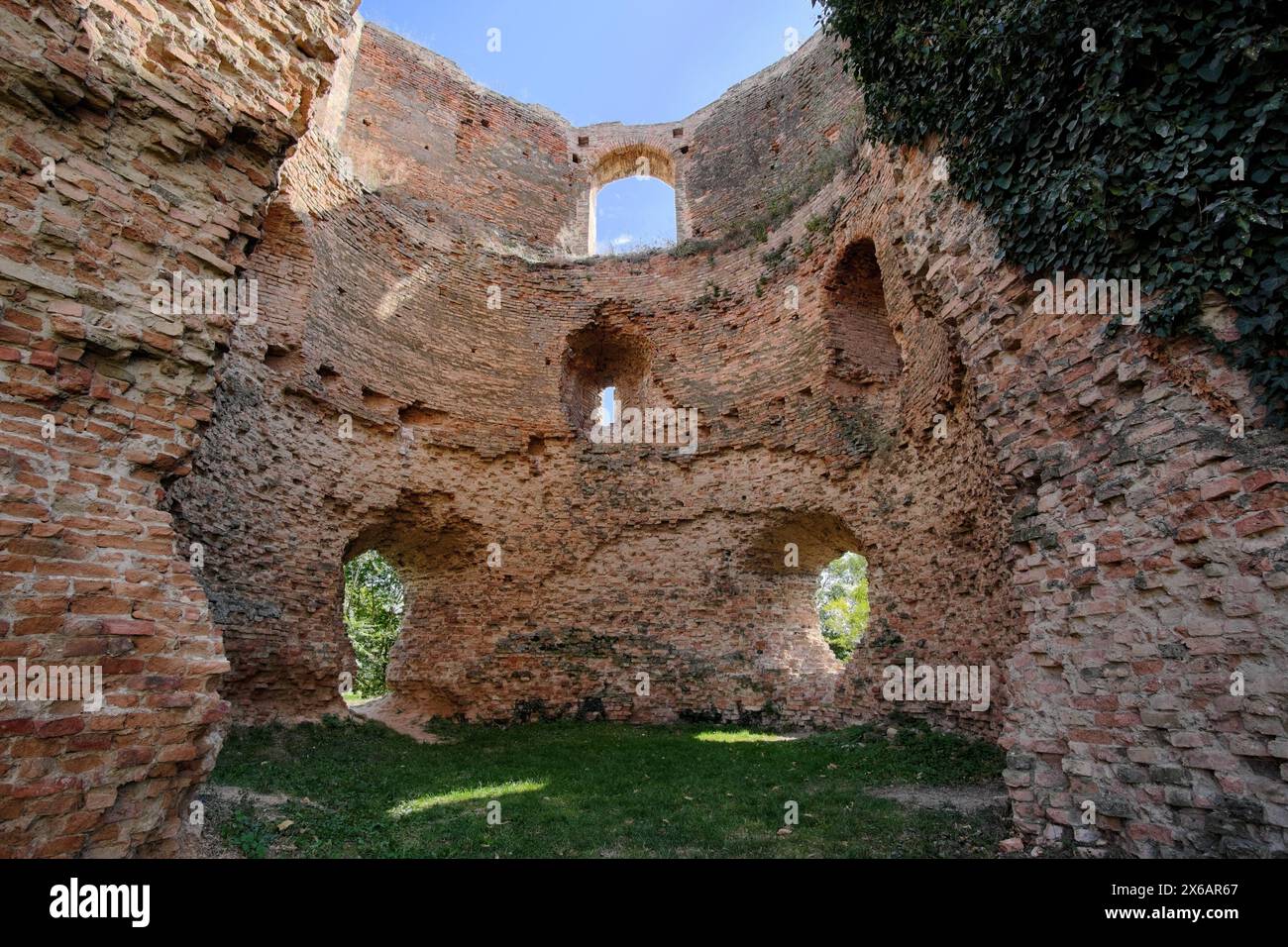 inside of a round ruined brick wall tower in the walls of Bac Fortress ...