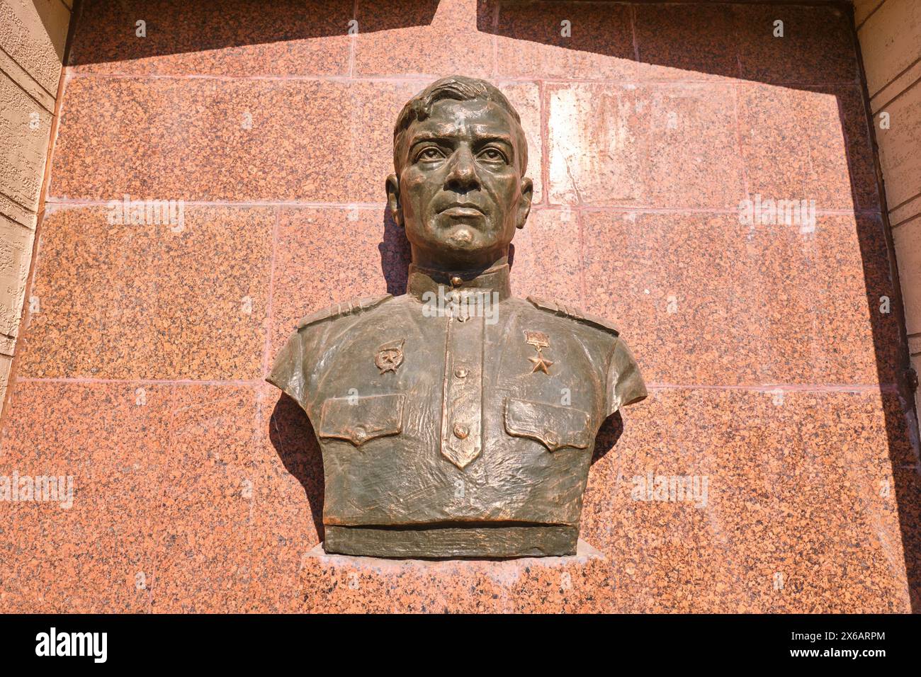 A bronze bust, sculpture, statue of a fallen, killed officer. At the ...
