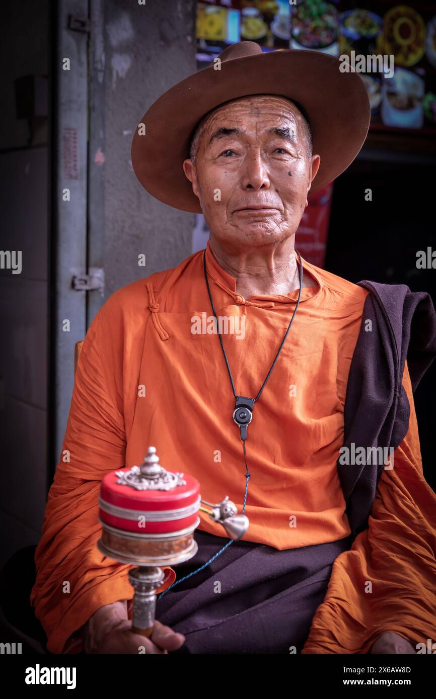 Portrait of elderly Tibetan man, Chengdu, Sichuan, China Stock Photo ...