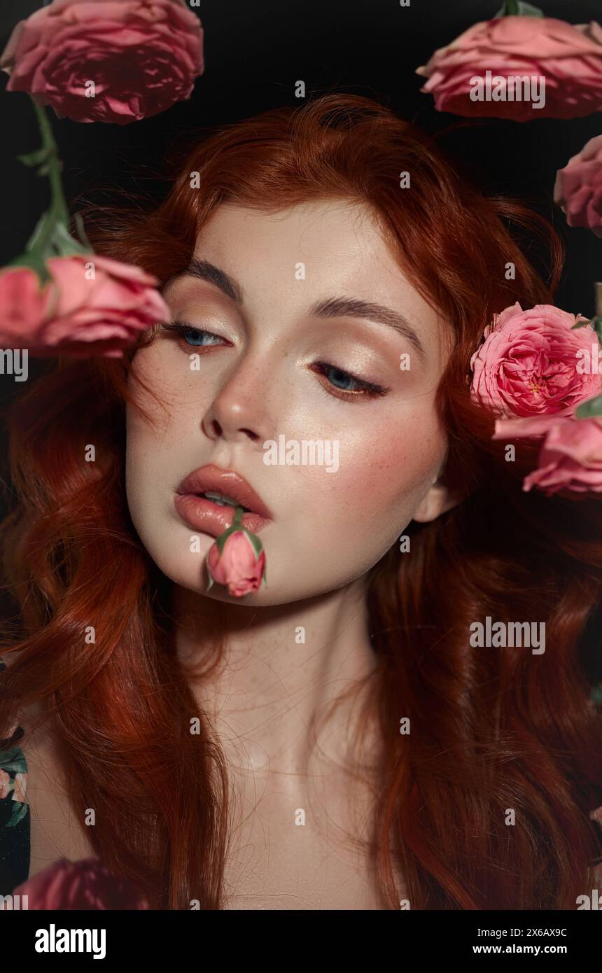 Red-haired woman with striking blue eyes looks away, surrounded by ...