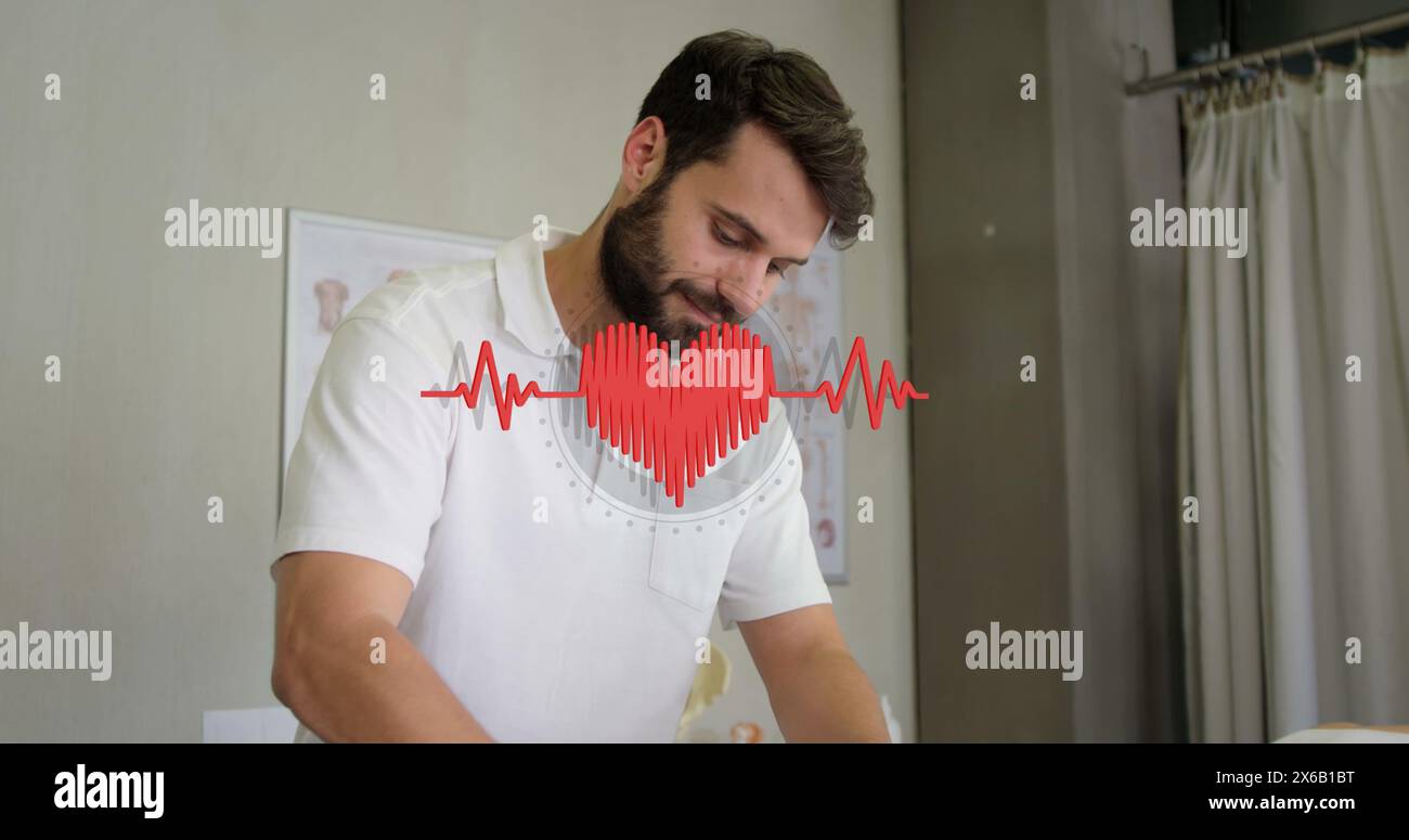 Image of heart over caucasian male massage therapist with female ...