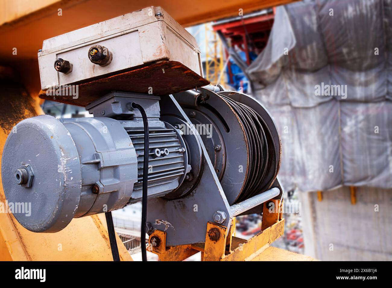 Lifting hoist to repair a tower crane Stock Photo - Alamy