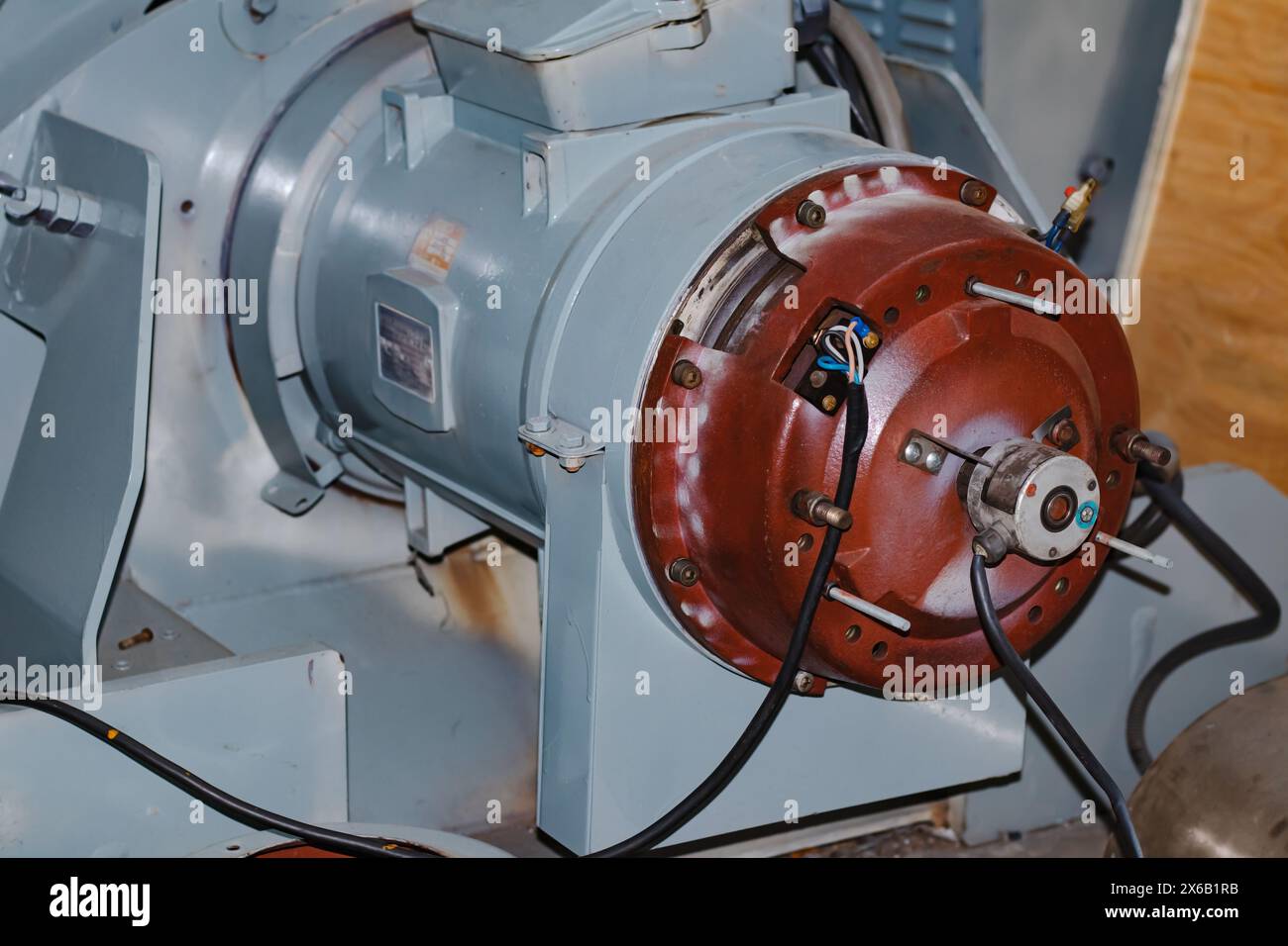 the technician removes the motor of the tower crane for repair and ...