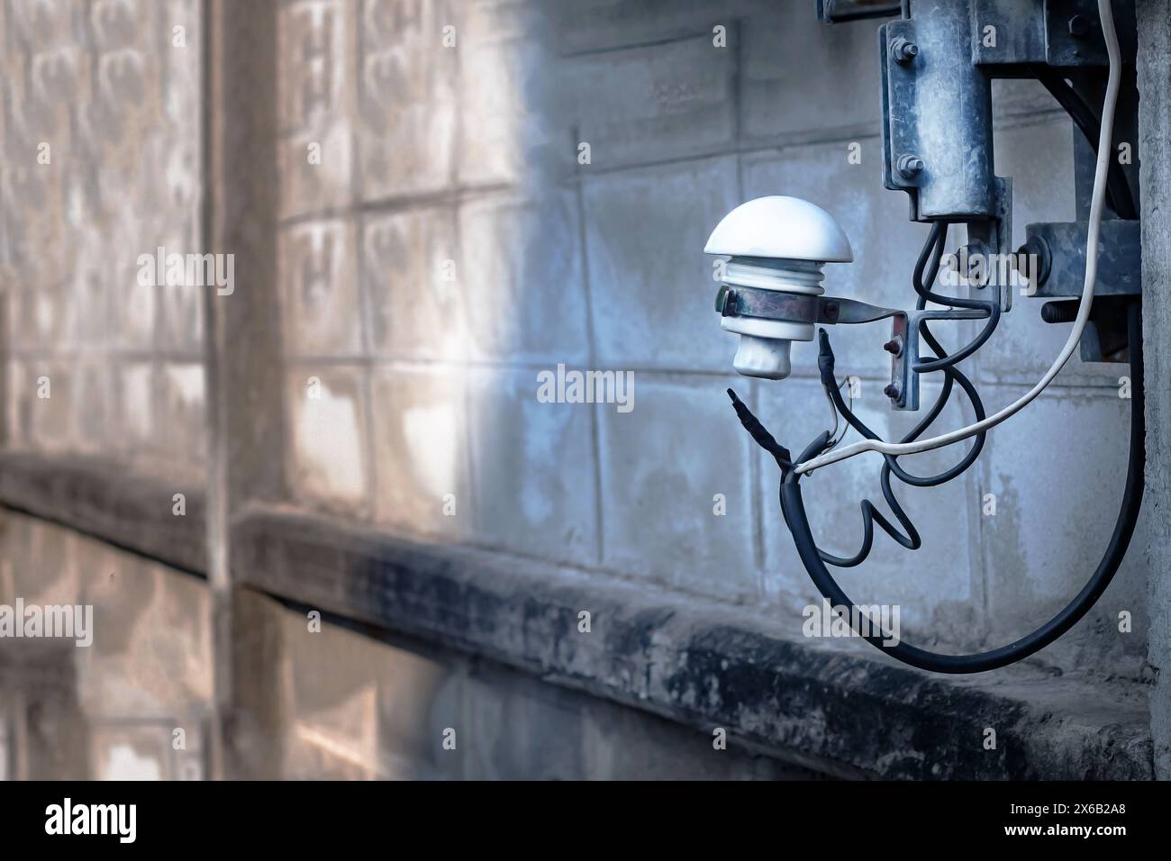 old photo sensor to switch lighting at street Stock Photo - Alamy