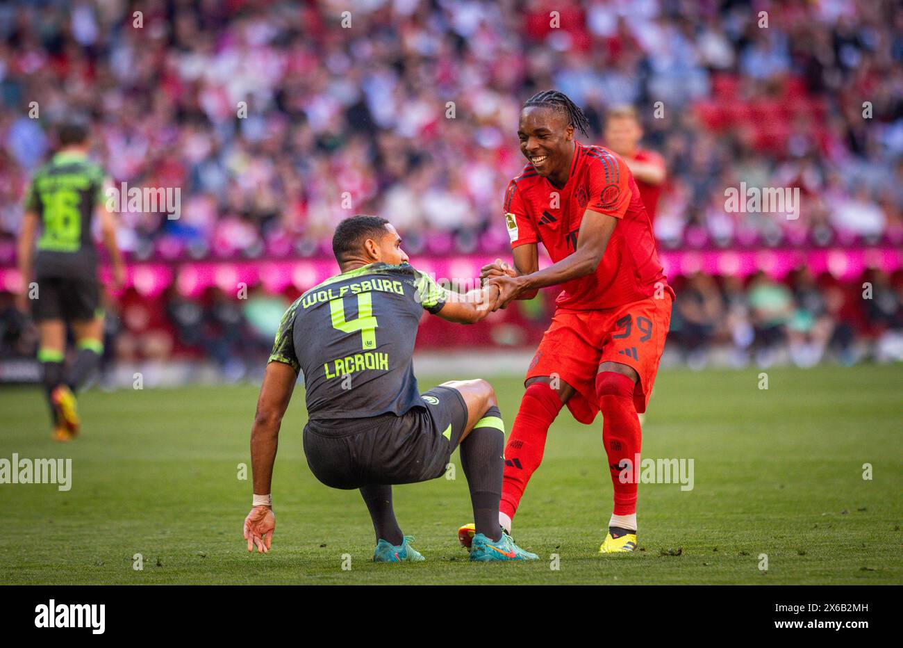 Munich, Germany.12th Mai 2024. Maxence Lacroix (Wolfsburg) Mathys Tel ...